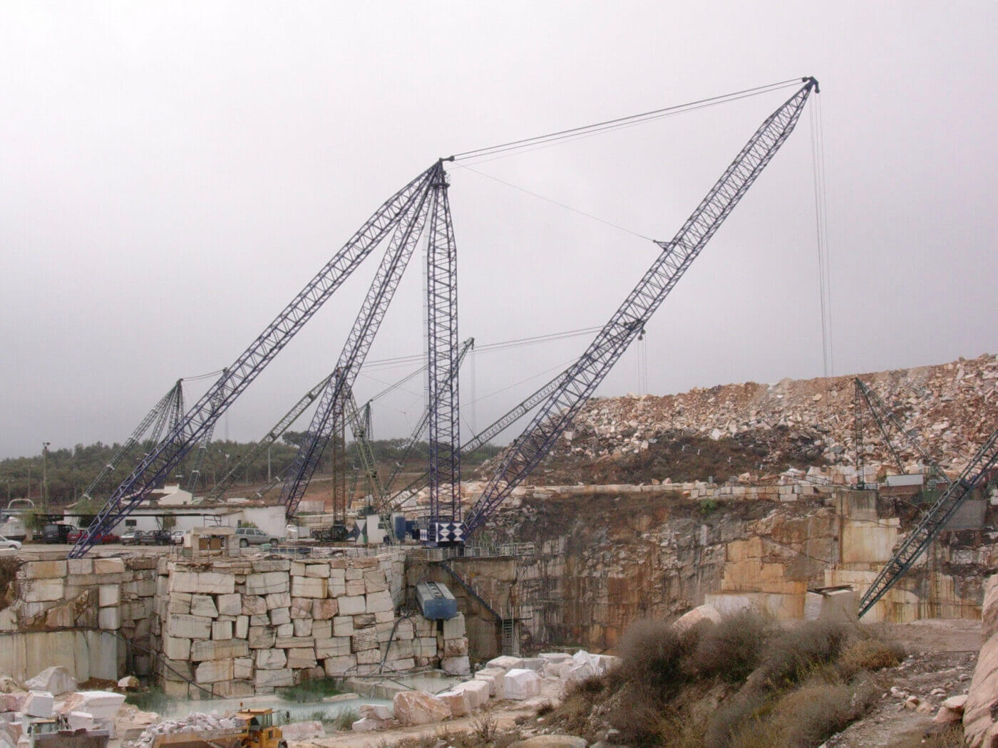 Giacomini Derrick Cranes - Eurostone Machine USA